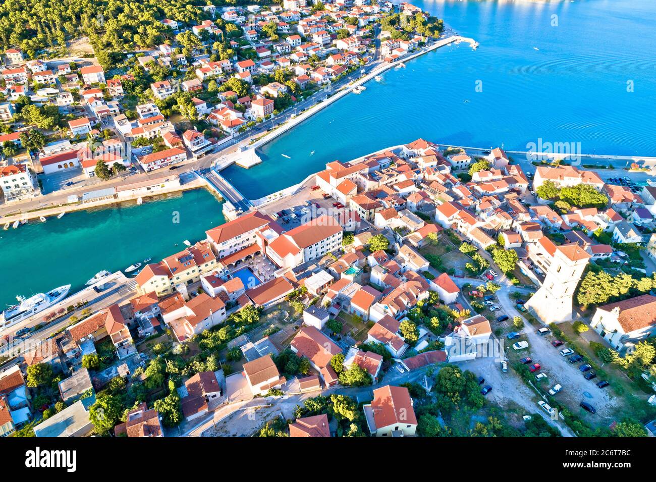 Coastal town of Tisno aerial panoramic view, bridge to island of Murter ...