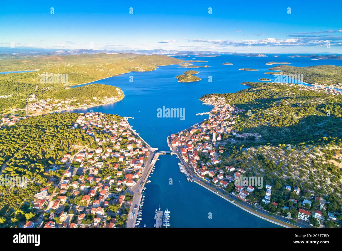 Coastal town of Tisno aerial panoramic view, bridge to island of Murter ...
