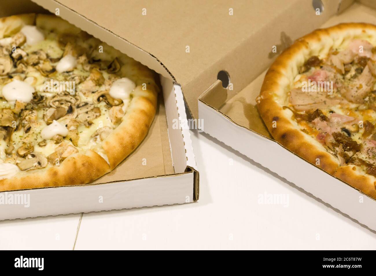 big pizza with mushrooms in a cardboard box Stock Photo - Alamy