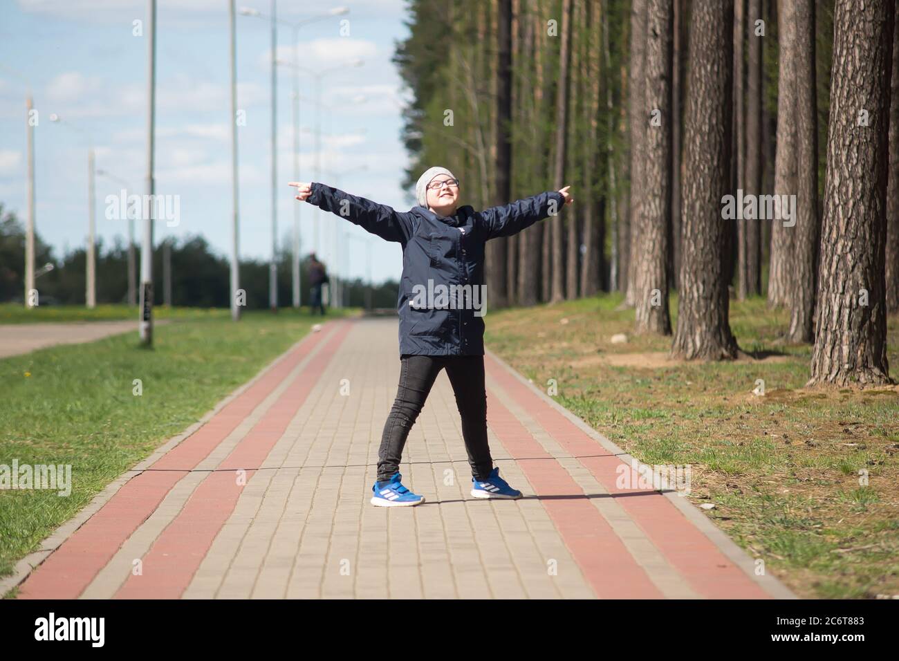 young guy walks in the fresh air and enjoys spring Stock Photo - Alamy