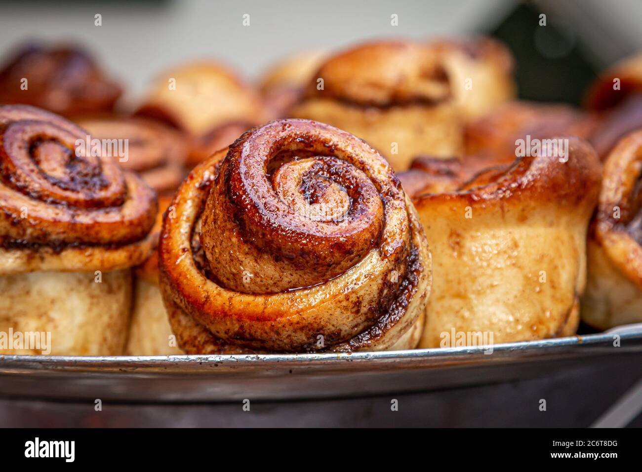A display of pastries for sale on a market stall Stock Photo - Alamy
