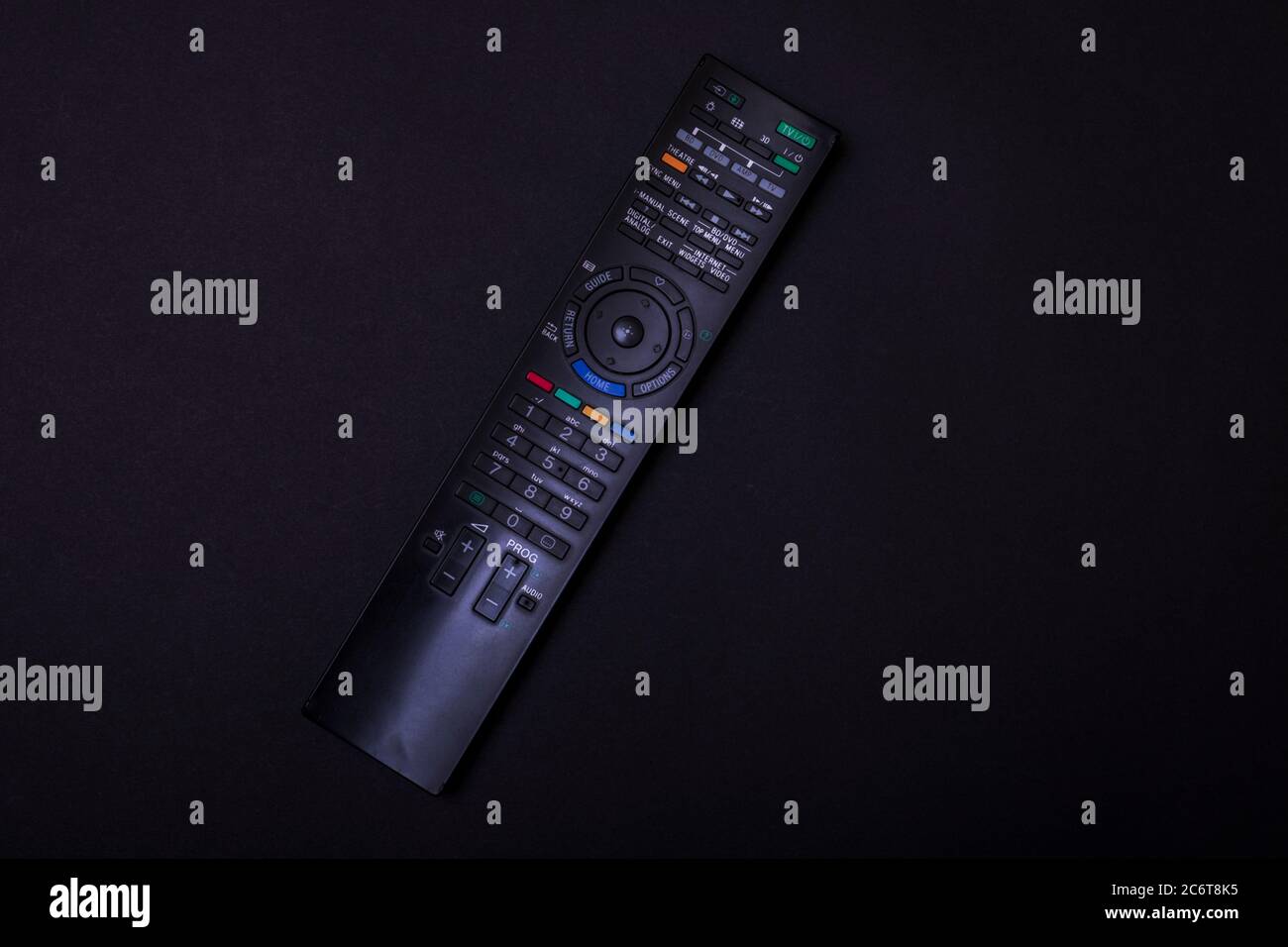 TV control on a black background. Multi control concept. Remote control ...