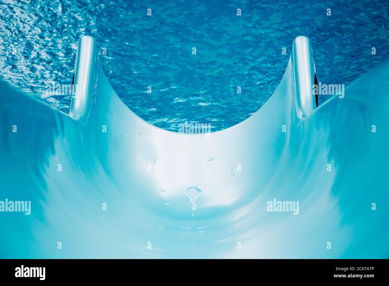 Blue swimming pool with water slide for background, high resolution ...
