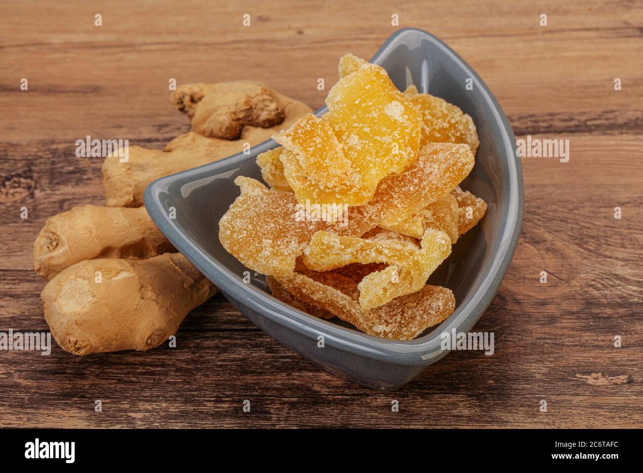Dry sweet ginger snack in the bowl Stock Photo - Alamy