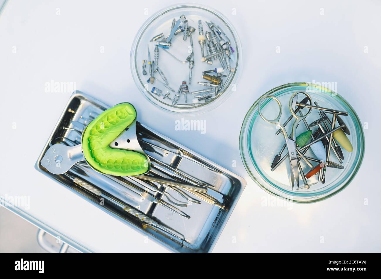Different professional dental equipment, instruments and tools in a ...