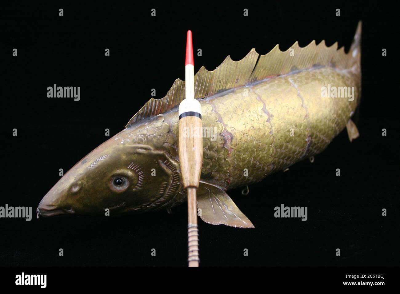 Cork laying on metal fish hi-res stock photography and images - Alamy