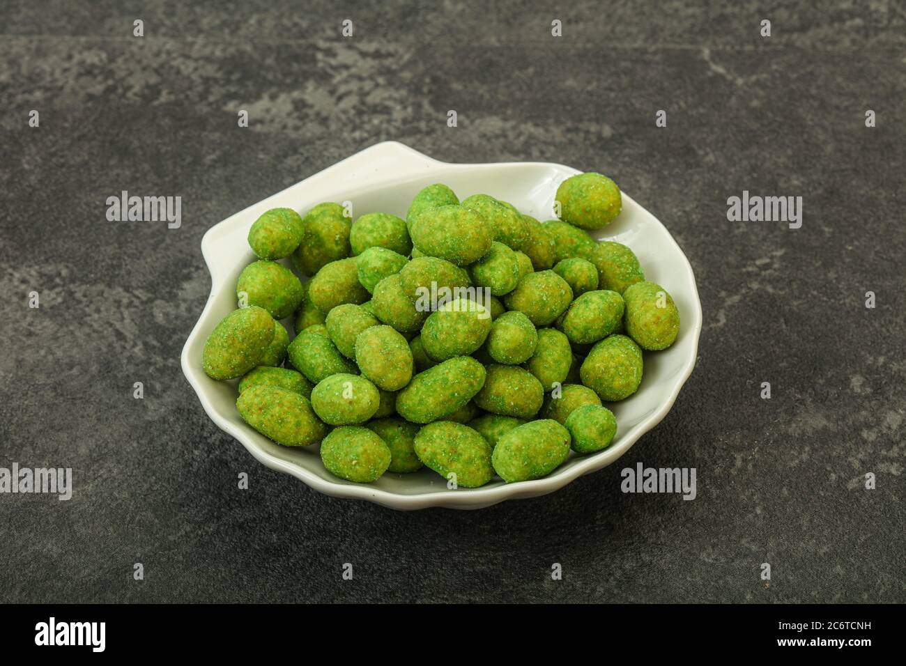 Spicy wasabi peanuts snack in the bowl Stock Photo - Alamy