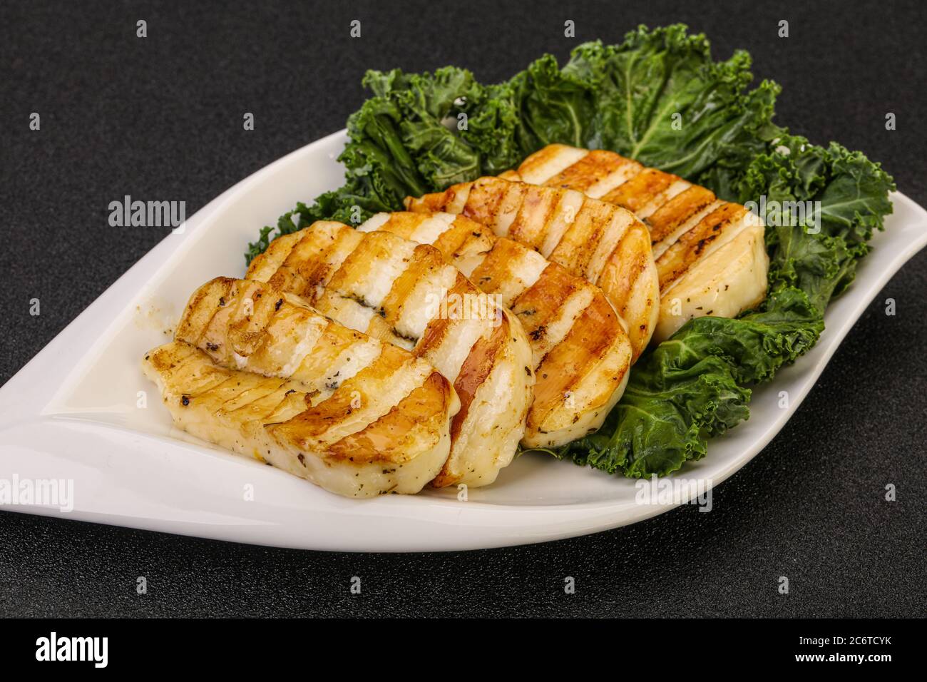 Grilled Greek haloumi cheese with herbs and spices Stock Photo - Alamy