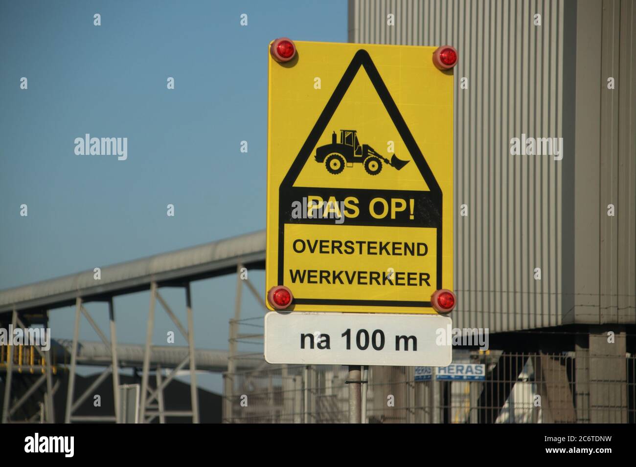 only on crossing work traffic sign in yellow in the Maasvlakte harbor ...