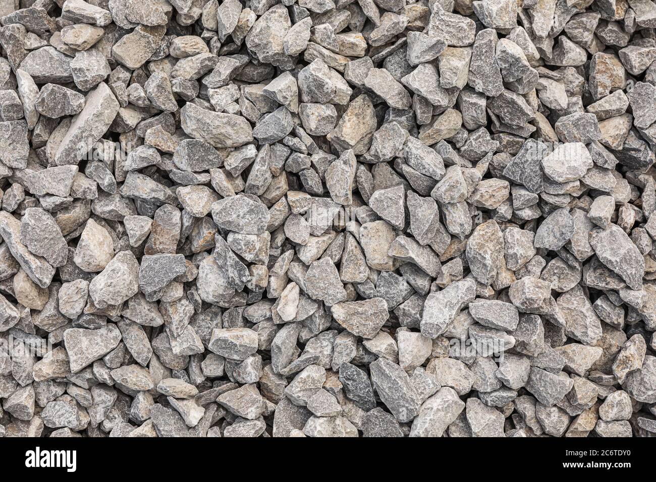 Grey crushed pebbles, background image. Crushed stone texture Stock ...