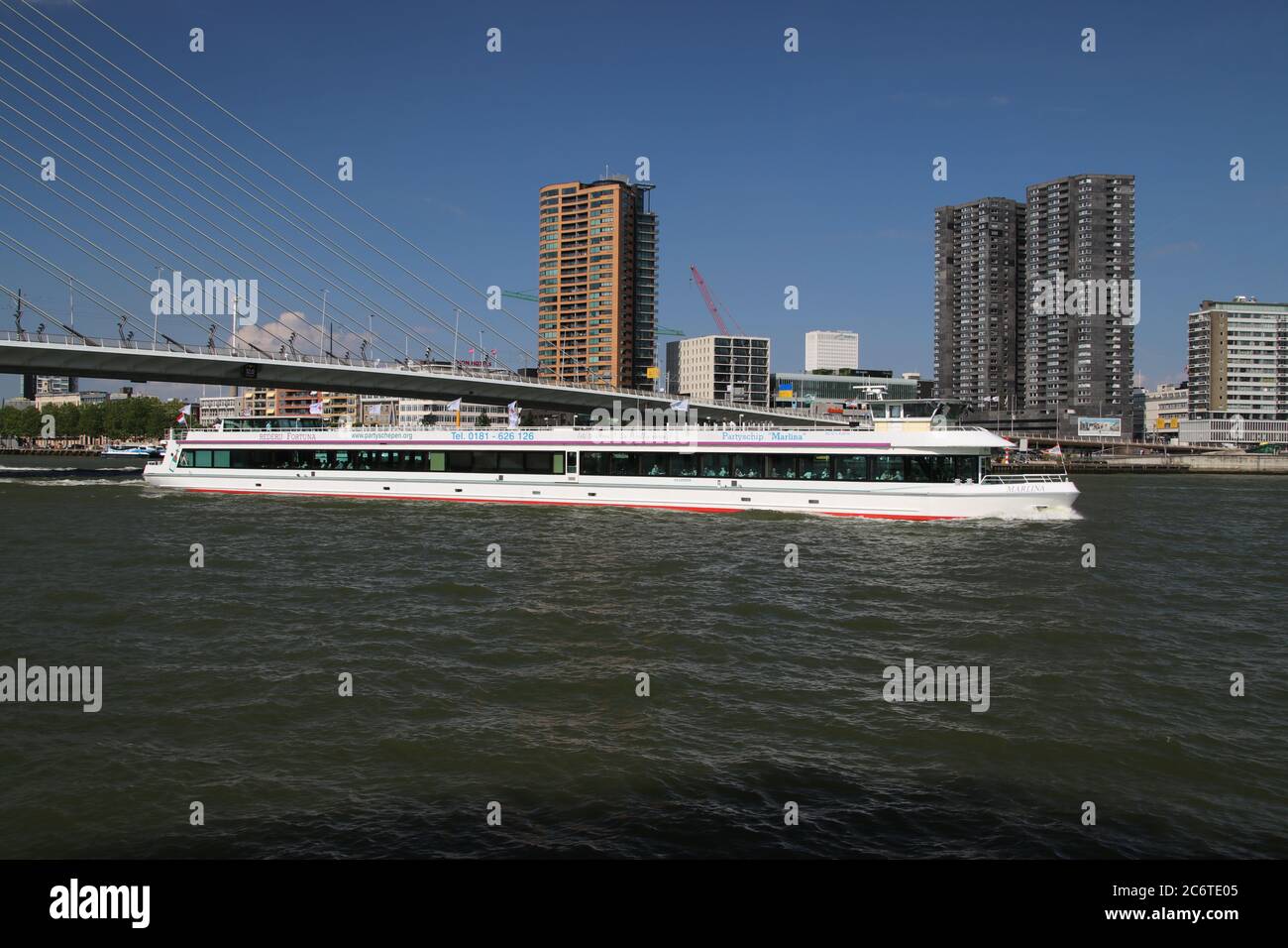 Cargo ship sails under bridge hi-res stock photography and images - Alamy