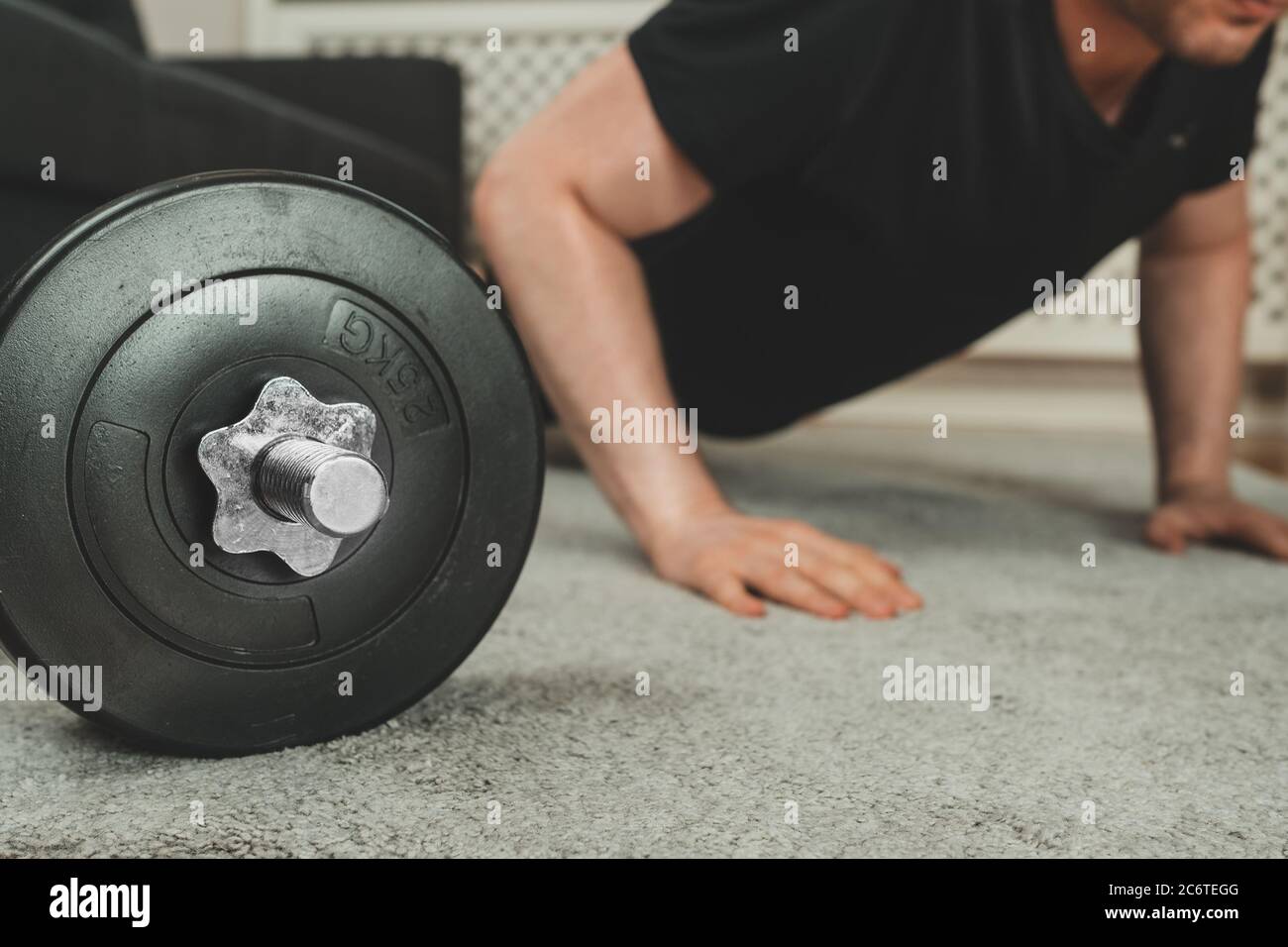 Man doing push-up exercises. Home fitness training concept Stock Photo ...