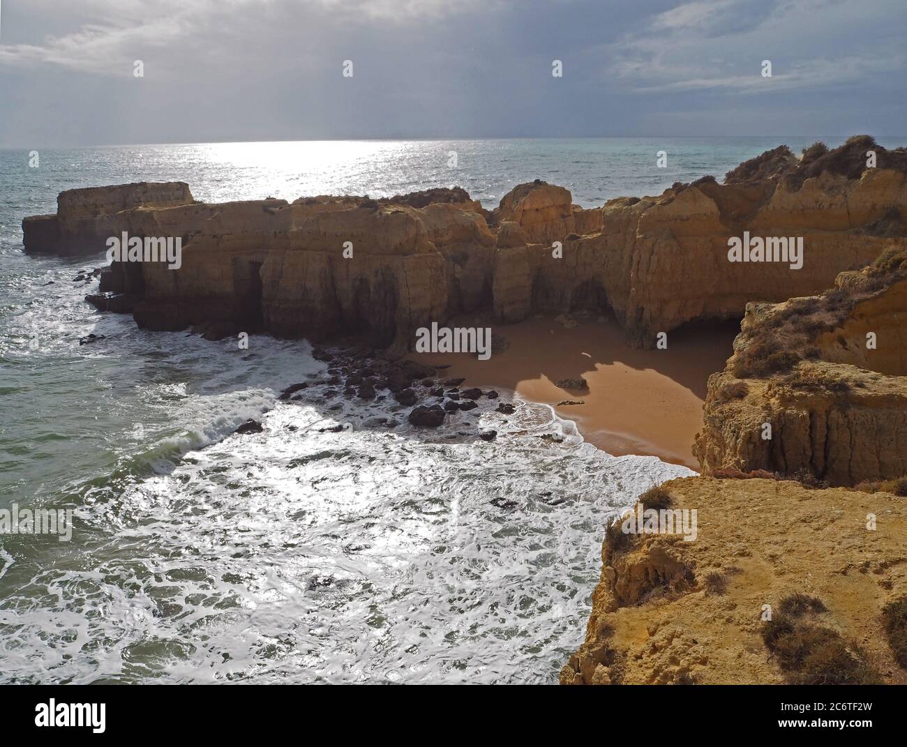 Golden sandstone cliffs beach hi-res stock photography and images - Alamy