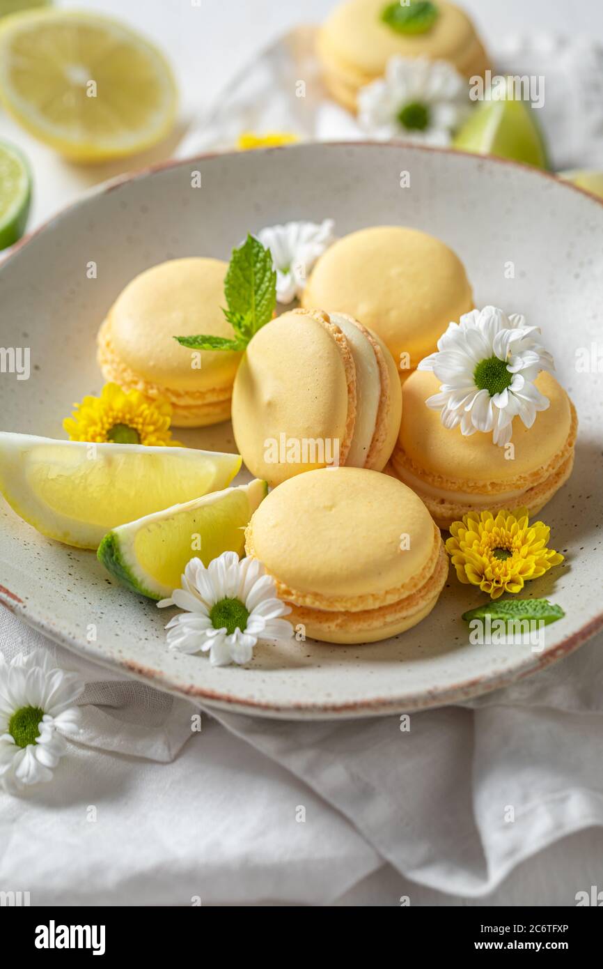 Sweet lemon macaroons as a tasty small snack Stock Photo - Alamy