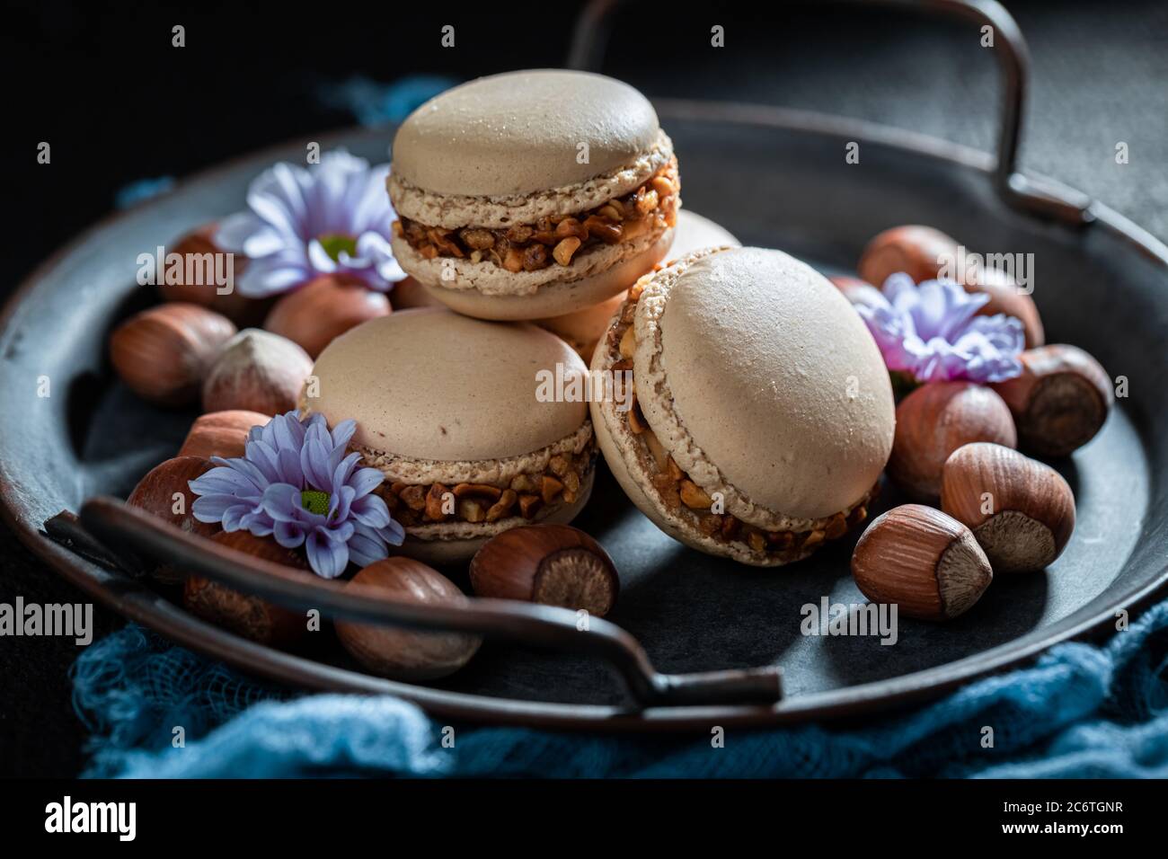 Brown hazelnut macaroons made of hazelnut and walnut Stock Photo - Alamy