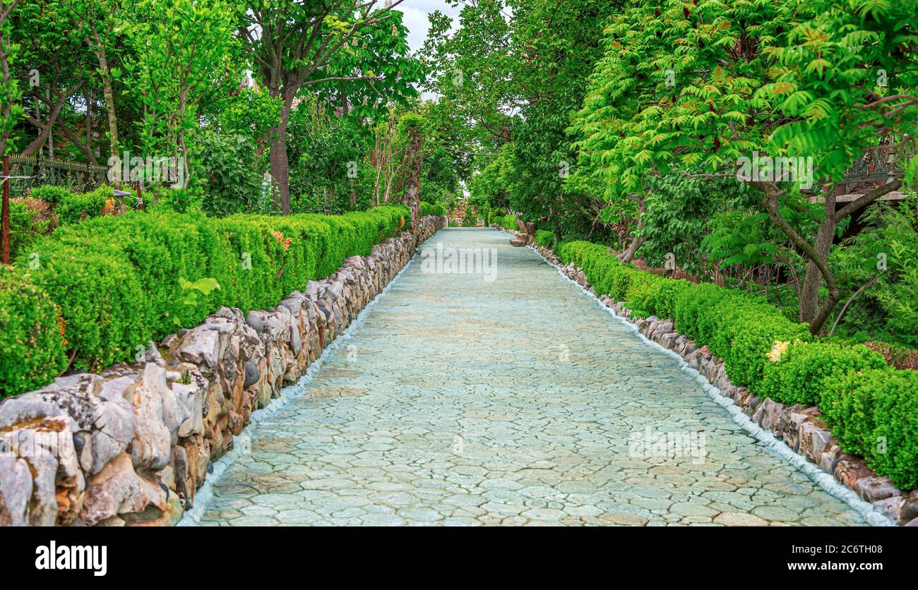 Brick walkway through park hi-res stock photography and images - Alamy