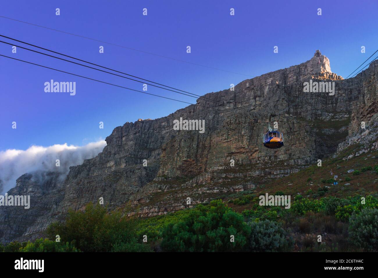 Cable car going up Table Mountain, Cape Town, South Africa at sunset ...