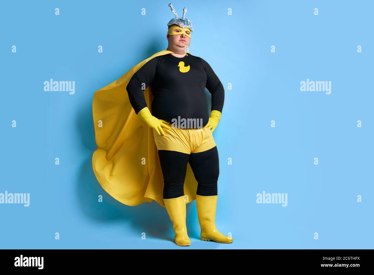 superhero fat caucasian male in mask and protective gloves posing. man ...