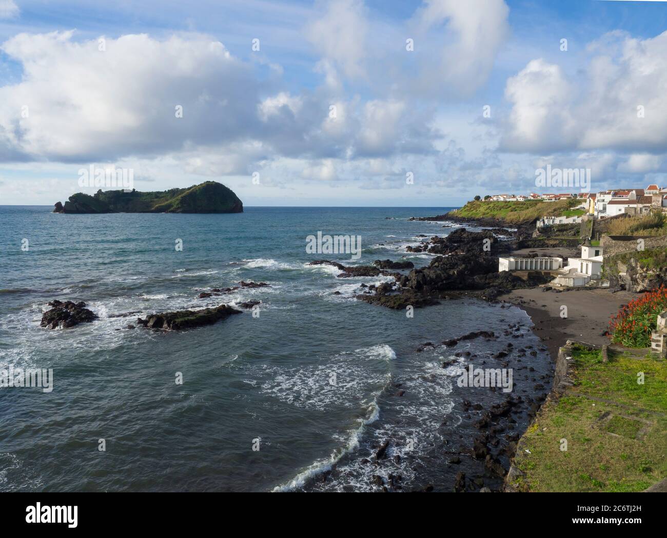 Sand beach of town Vila Franca do Campo with its famous volcanic islet ...