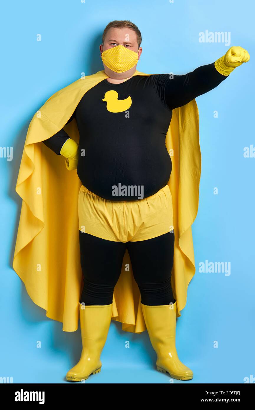 let's save the planet from dirt portrait of cleaning fat man in yellow ...