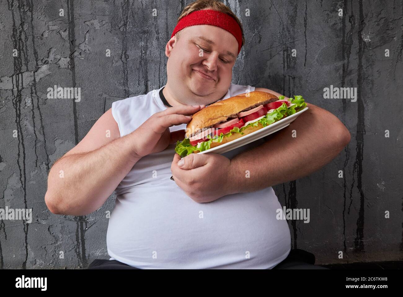 Fat guy eating healthy food hi-res stock photography and images - Alamy