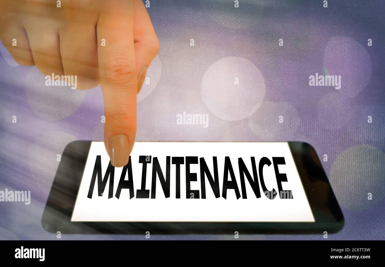 Writing note showing Maintenance. Business concept for method of ...