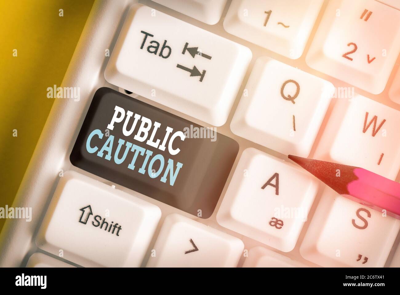 Caution keyboard key showing business hi-res stock photography and ...