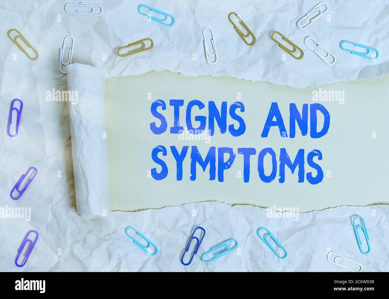 Writing note showing Signs And Symptoms. Business concept for ...
