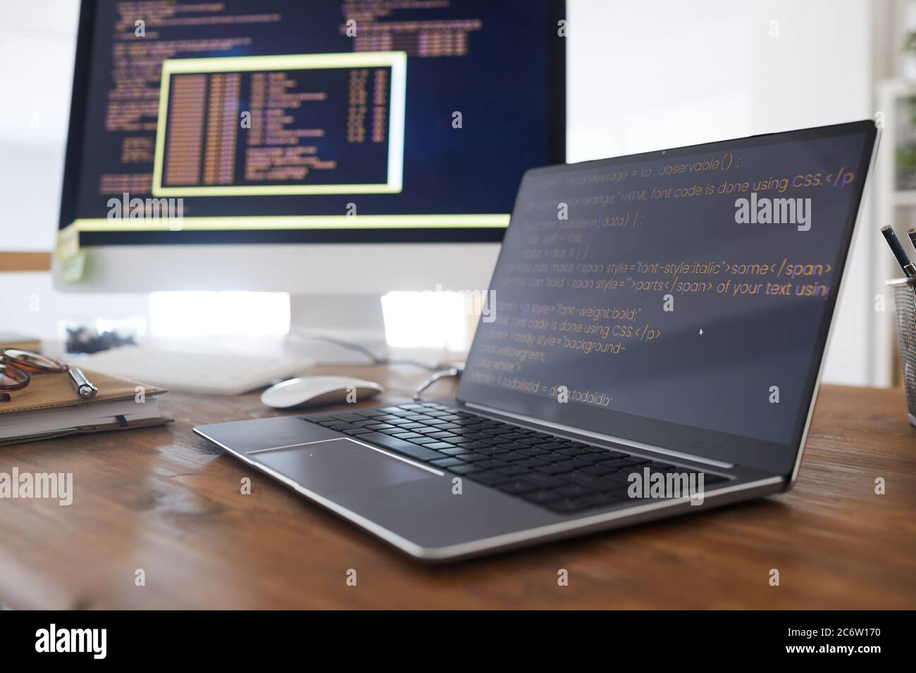 Close up background image of black and orange programming code on ...