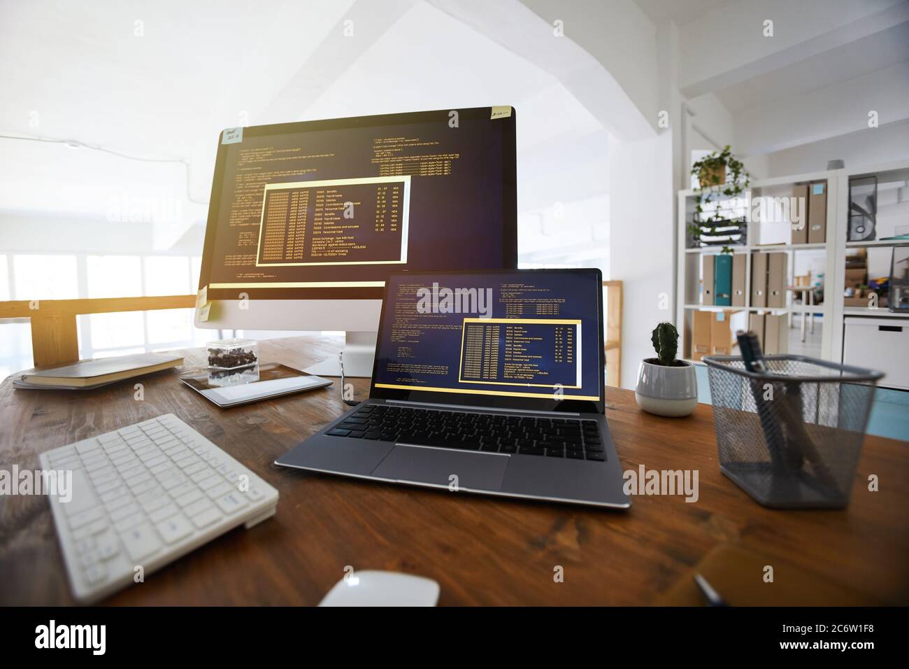 Fisheye background image of black and orange programming code on ...