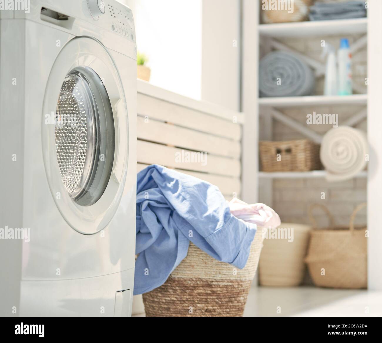 Interior of a real laundry room with a washing machine at home Stock ...