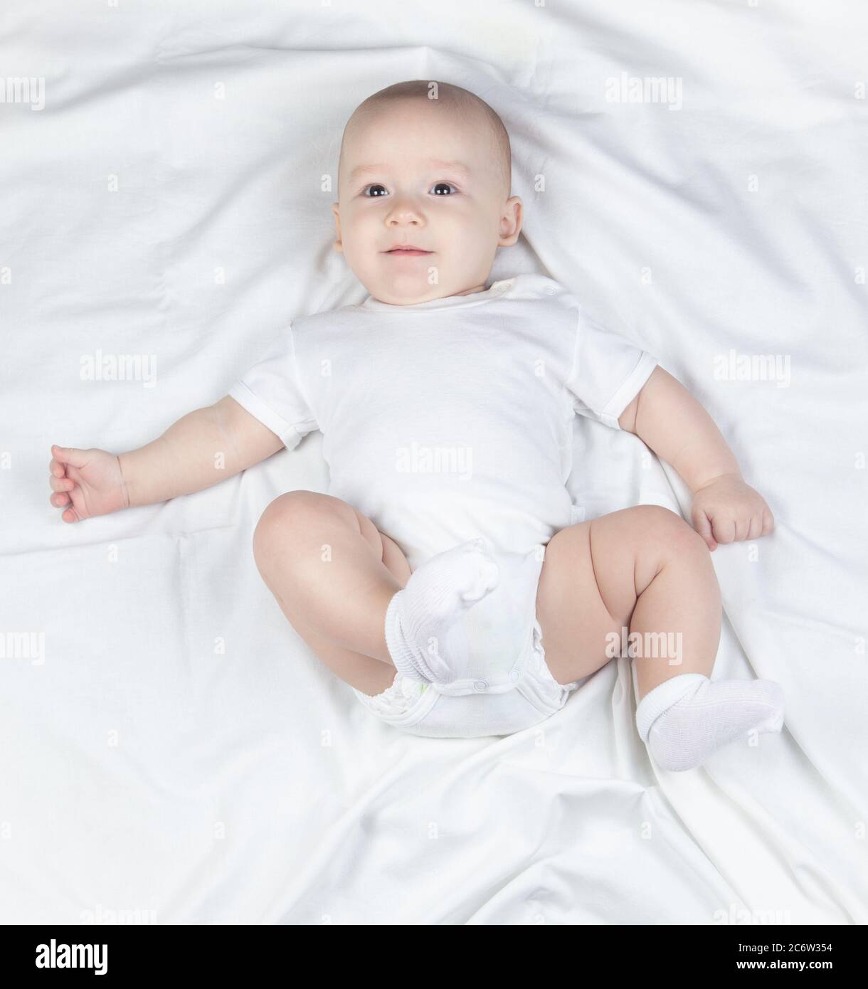 Image of a six month old baby boy Stock Photo - Alamy