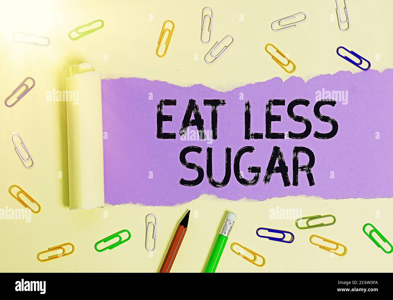 Writing note showing Eat Less Sugar. Business concept for reducing ...