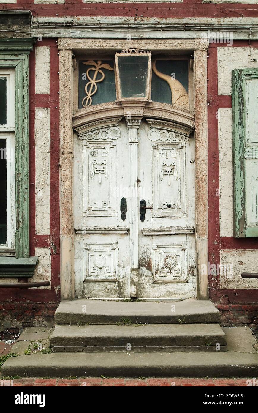 Very old and rotten door of a vinatge pharmacy Stock Photo - Alamy