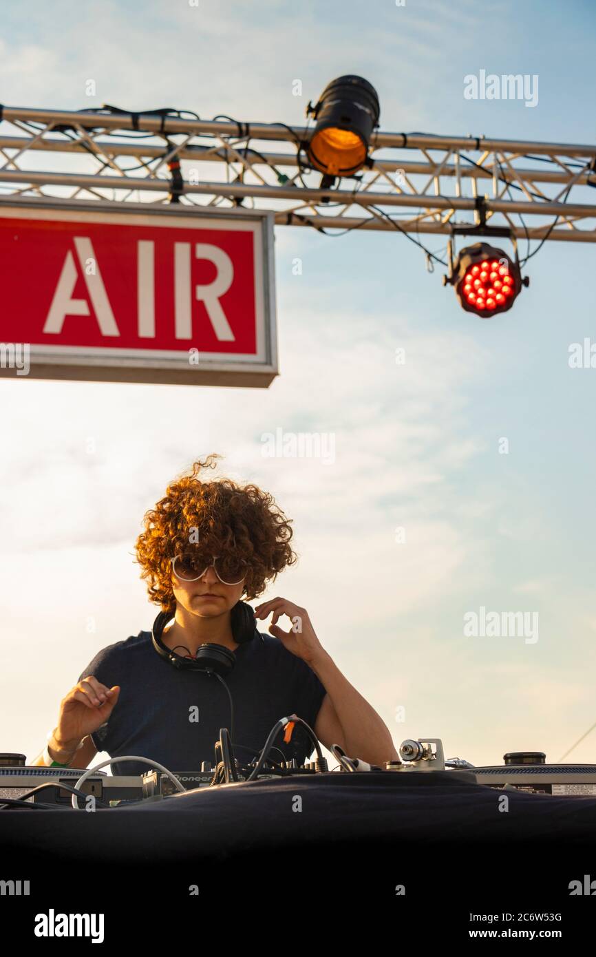 DJ against sunset sky at rooftop party In Marseille France at rooftop ...