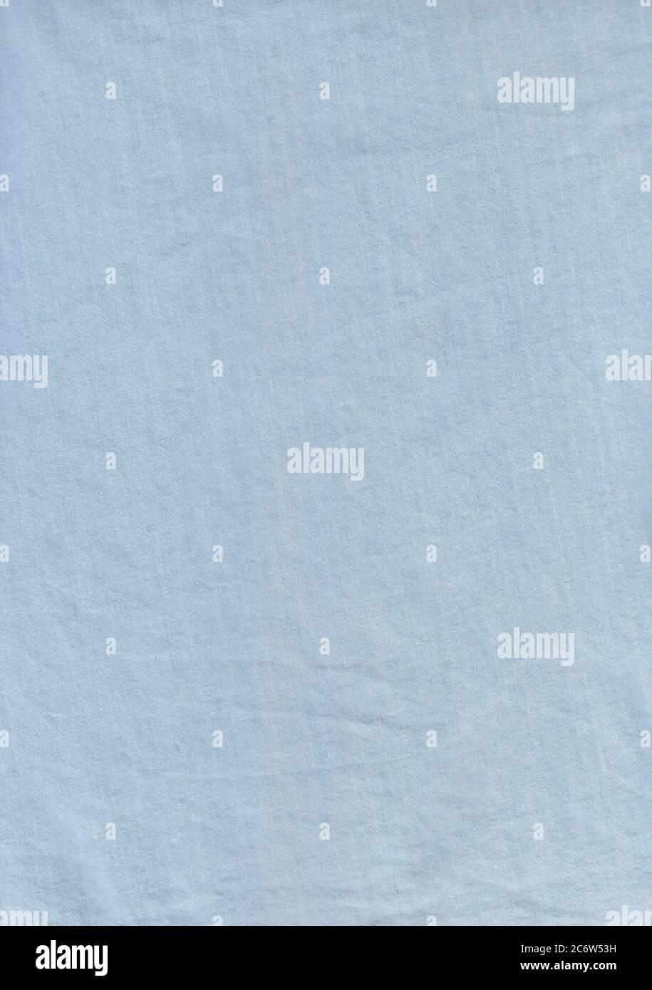 A sky blue color fabric Background. A jeans fabric use for making shirt ...