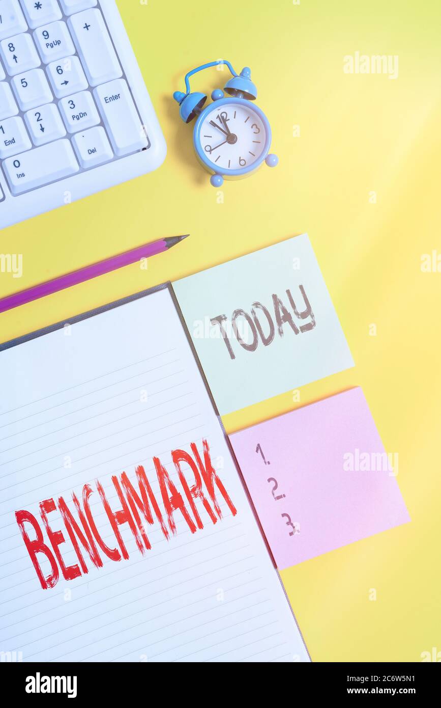 Handwriting text writing Benchmark. Conceptual photo a reference point ...