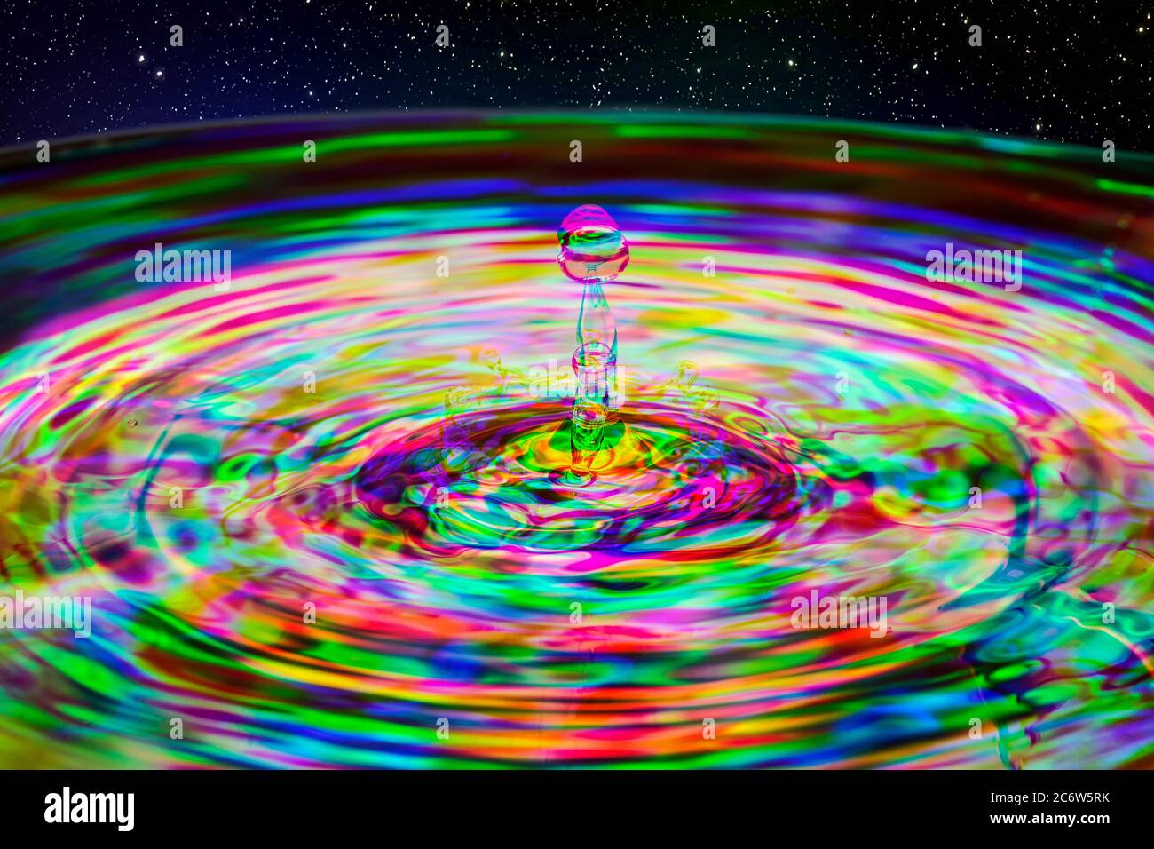 Water drop ripple splash with abstract multi coloured Harris Shutter ...