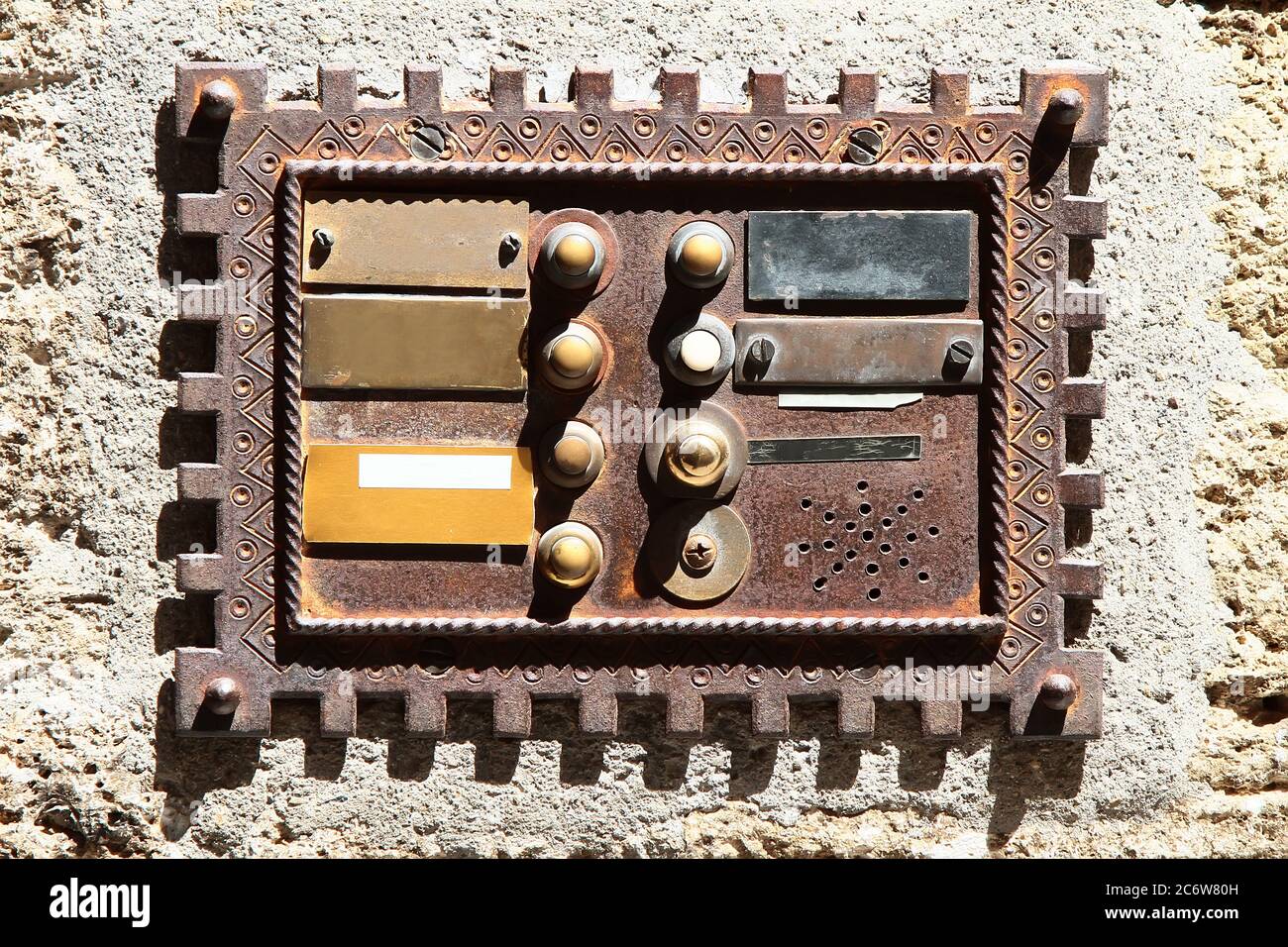 Vintage aged iron rusty wall mounted doorbell with brass buttons ...