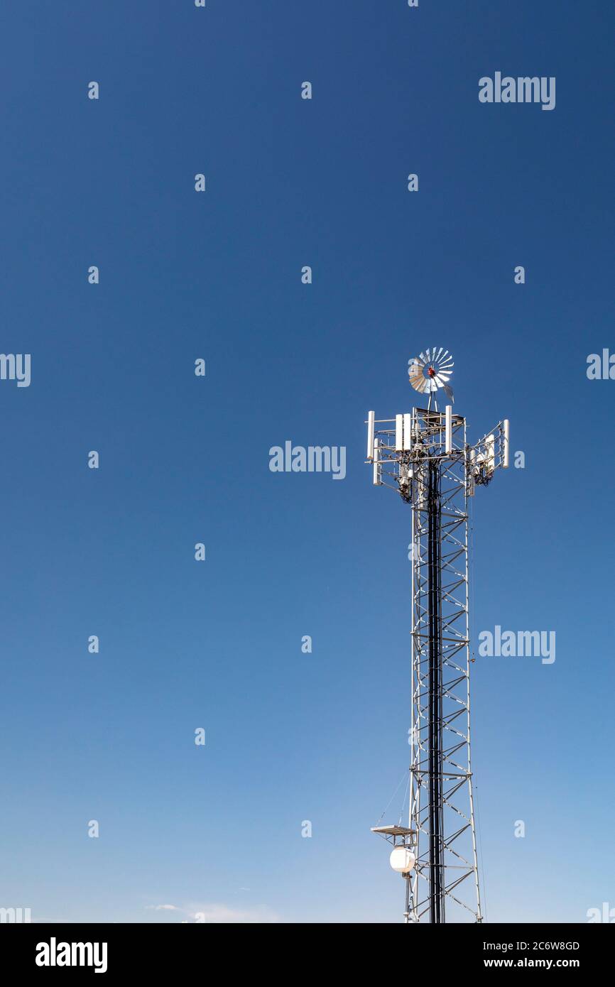 Hudson, Colorado - A windmill on top of a communications tower in ...