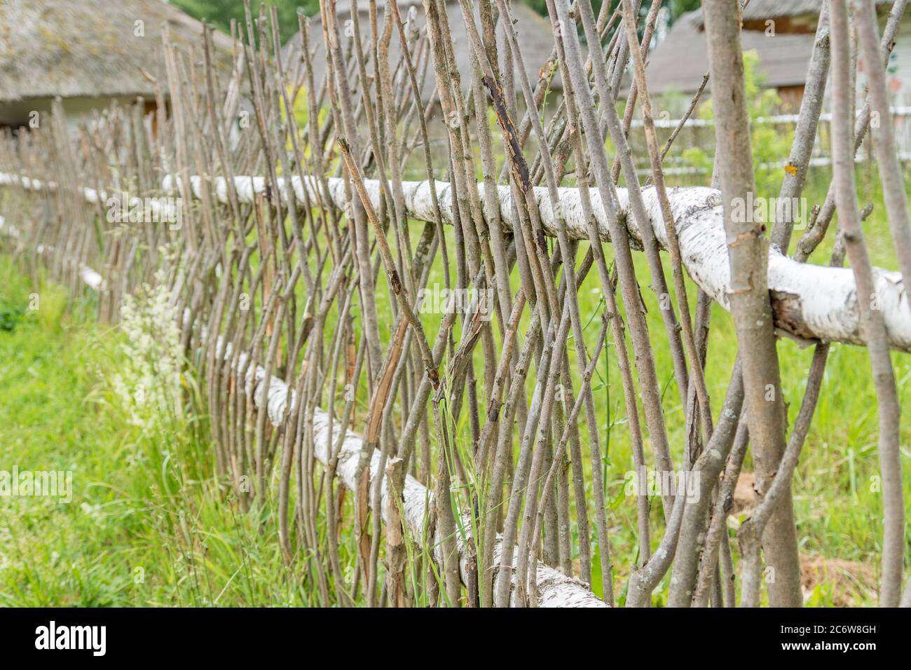 Wicker fence made of natural branches, beackground, texture Stock Photo ...