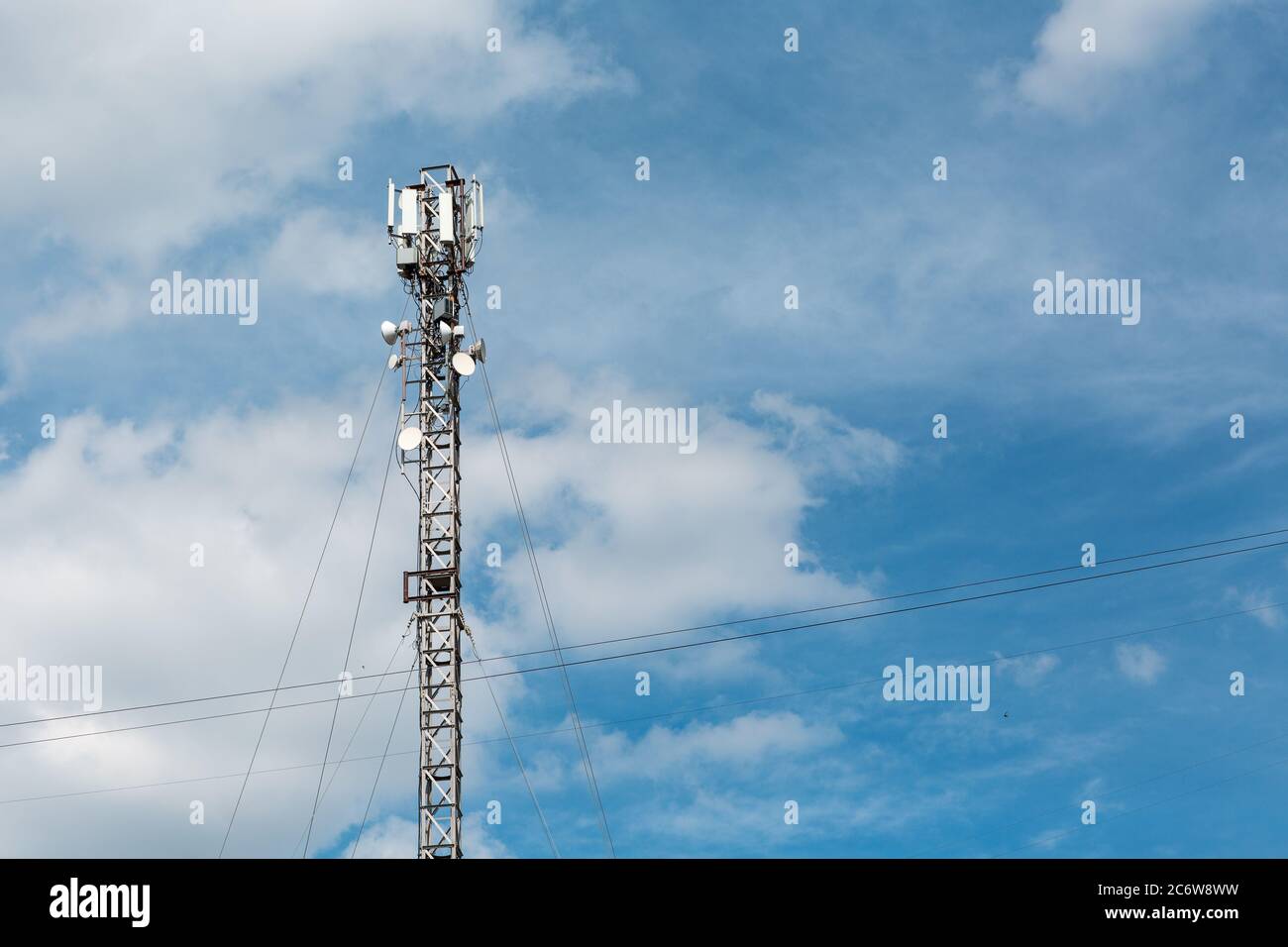 Antenna of Communication Building and blue sky Stock Photo - Alamy