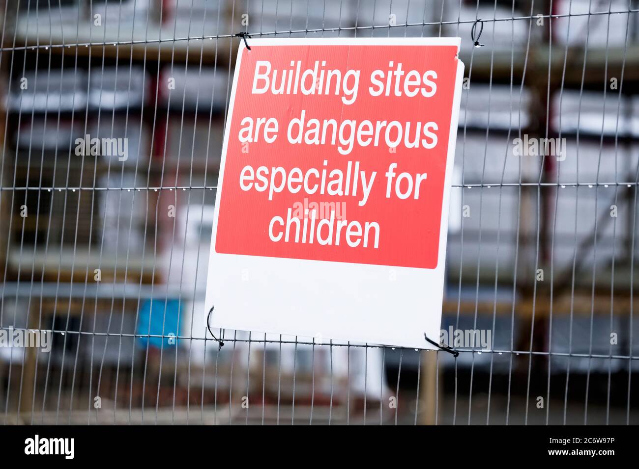 Children must not play on scaffolding at construction building site ...