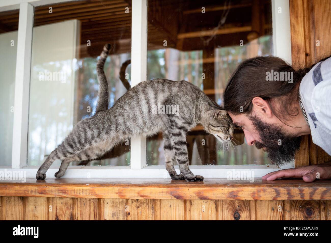 Man touching head summer hi-res stock photography and images - Alamy