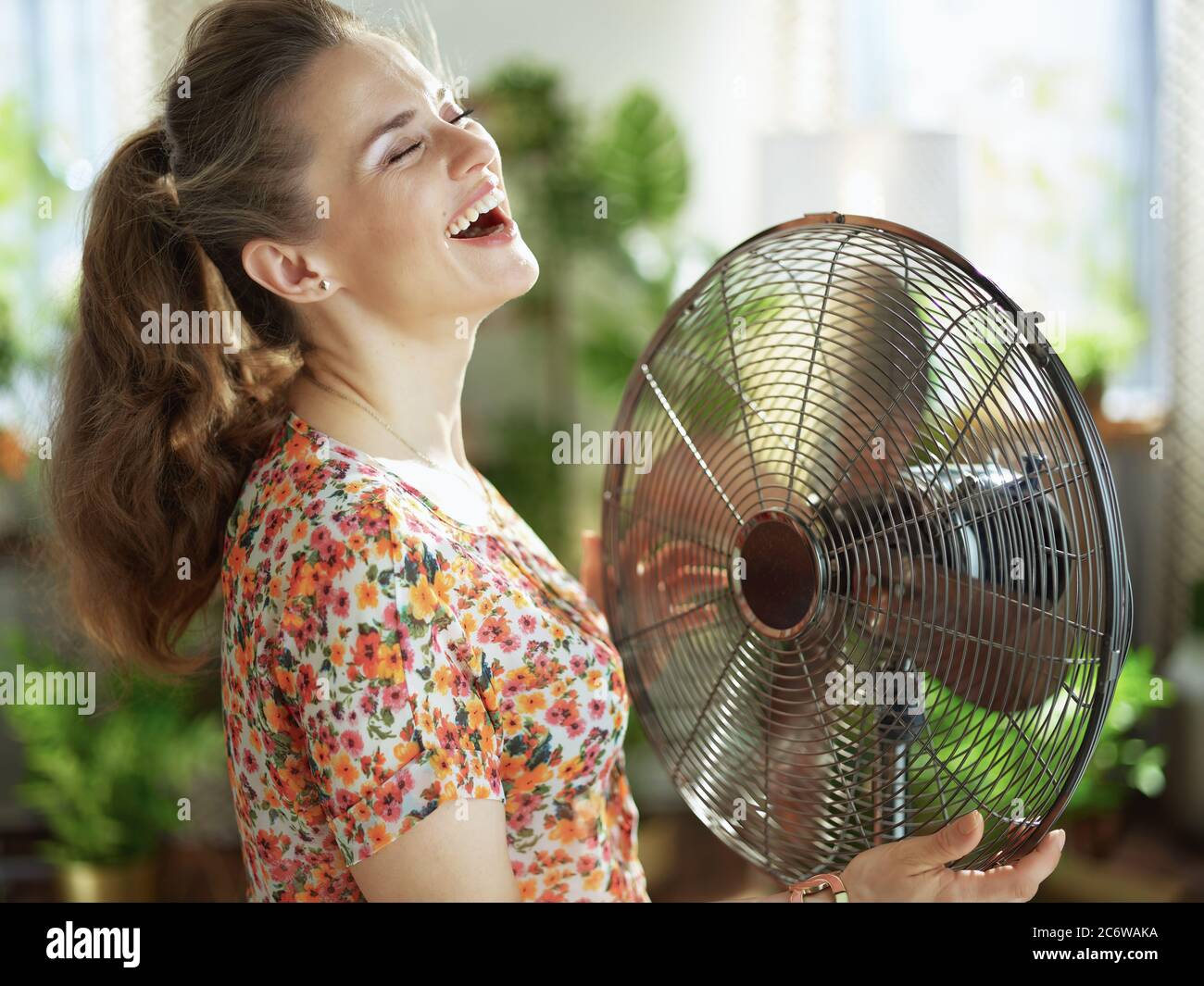 Fan blowing hi-res stock photography and images - Alamy