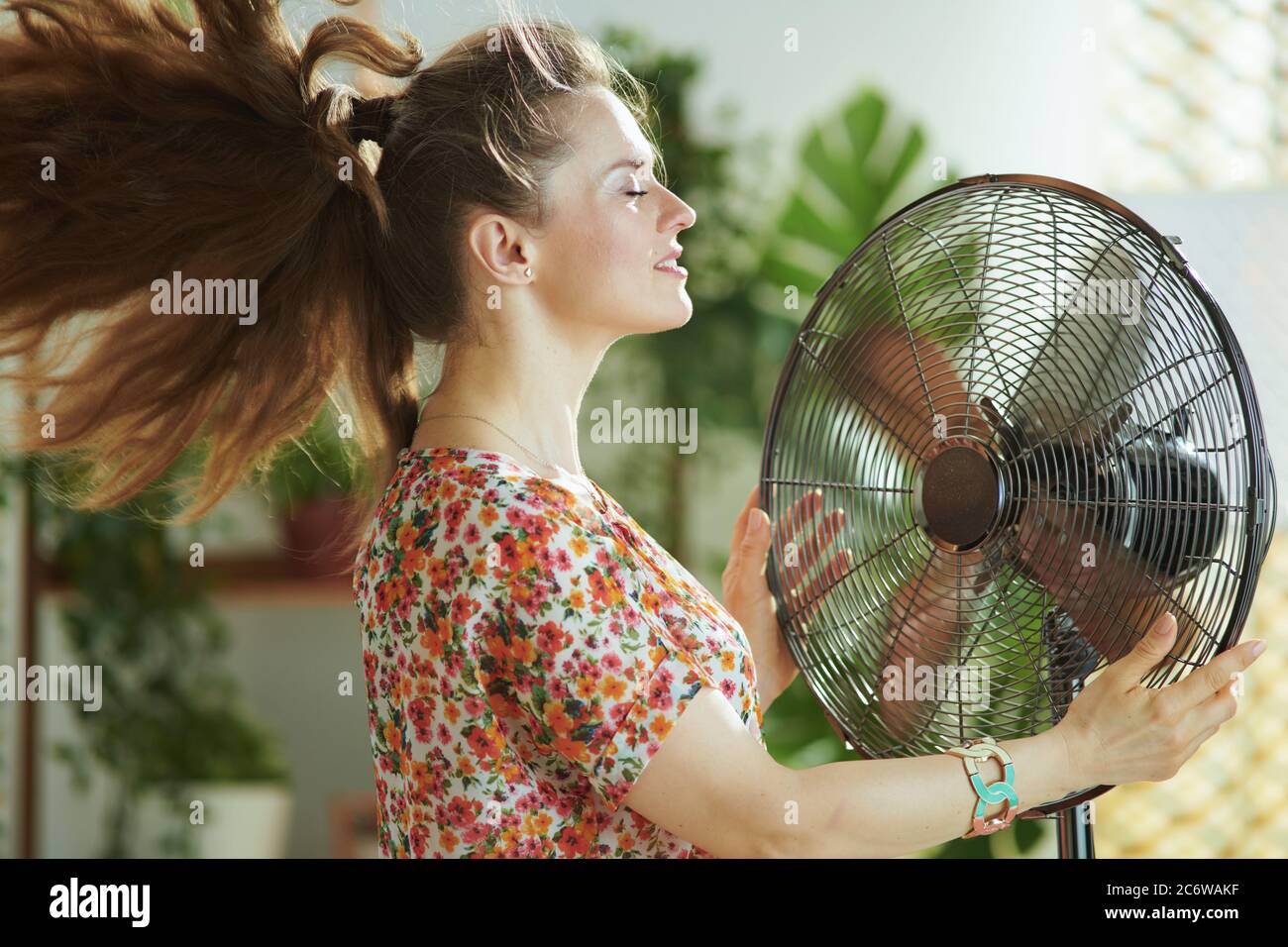 Woman fanning herself in the heat hi-res stock photography and images ...