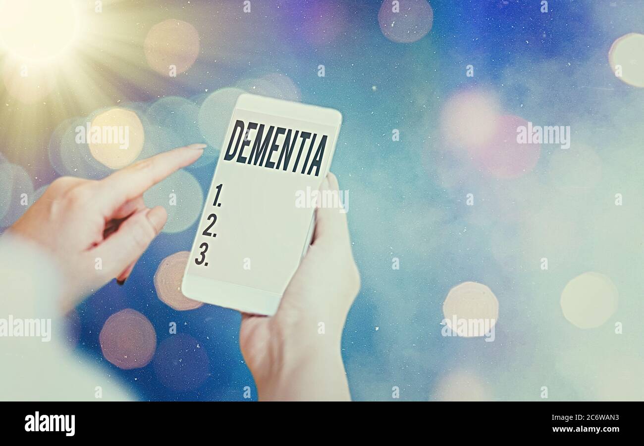 Conceptual hand writing showing Dementia. Concept meaning the general ...