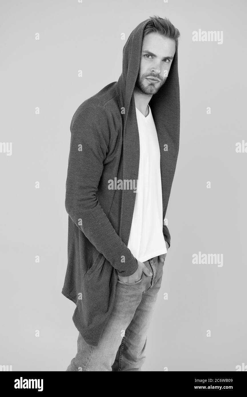 Fashion design gives sporty feel. Fashion man yellow background ...