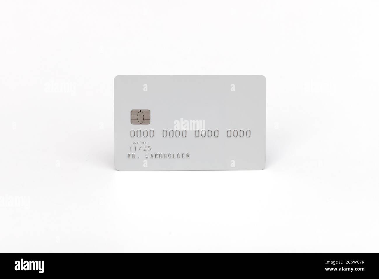 White credit card on a white background with natural shadow Stock Photo ...