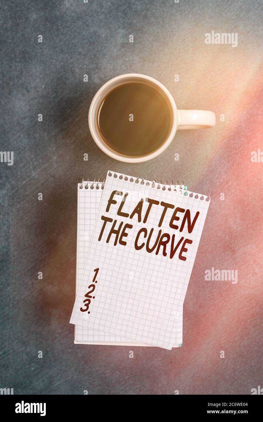 Conceptual hand writing showing Flatten The Curve. Concept meaning ...